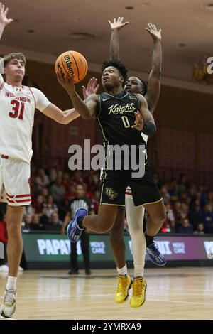 UCF guard Jordan Ivy-Curry attempts a shot over Baylor guard Jeremy ...