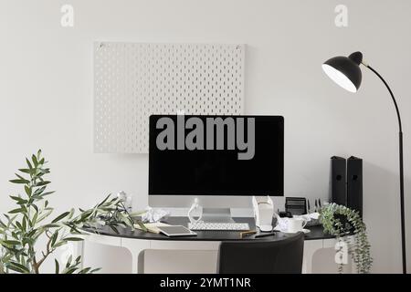 Messy workplace with computer and garbage in office Stock Photo - Alamy