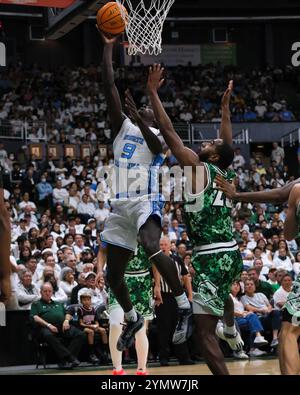 North Carolina guard Drake Powell dunks against Duke during the first ...