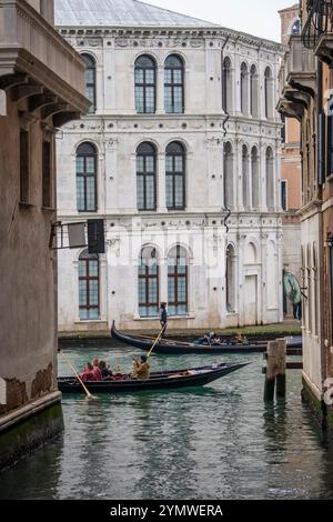 Traditional gondolas on the narrow canal in Venice, Italy Stock Photo ...