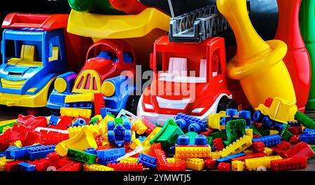 Composition with colorful plastic children toys Stock Photo - Alamy