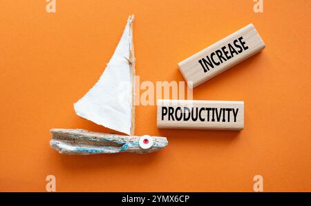 Increase Productivity symbol. Wooden blocks with words Increase ...