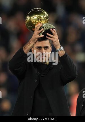 Manchester City's Rodri with his Ballon d'Or Golden Ball trophy ahead ...