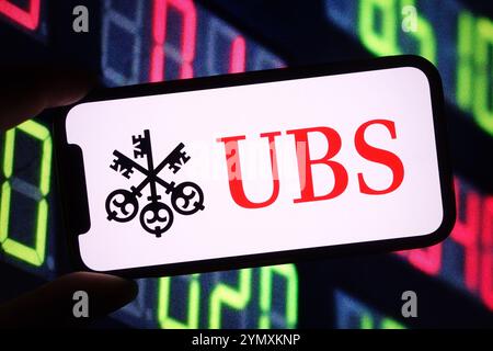 In this photo illustration, the UBS company logo is seen displayed on a ...