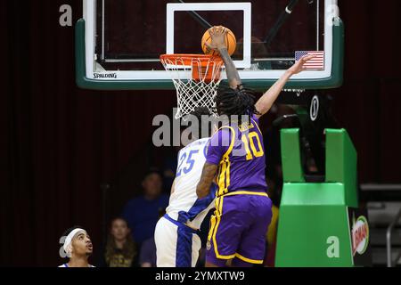 LSU forward Daimion Collins (10) dunks against Mississippi guard Dre ...