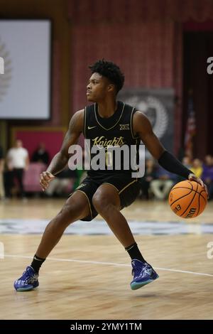 UCF guard Jordan Ivy-Curry attempts a shot over Baylor guard Jeremy ...