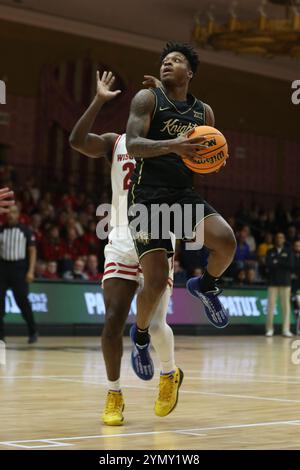 UCF guard Jordan Ivy-Curry drives up court during the first half of an ...