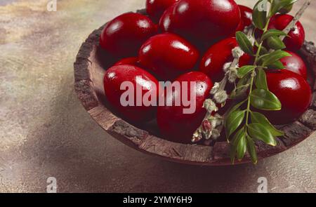 A top view of colourfully painted Easter eggs arranged in a line with a ...