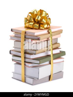 Stack of books with golden bow as gift isolated on white Stock Photo ...