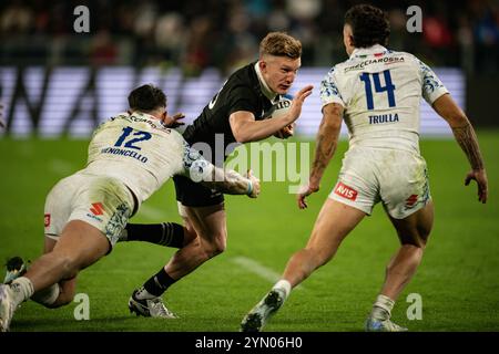 New Zealand's Damian McKenzie (centre) celebrates with team-mates after ...