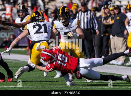 Iowa wide receiver Kaden Wetjen (21) runs for a touchdown as he returns ...
