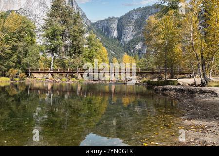 Yosemite Valley wooden footbridge near Curry Village. The bridge is ...