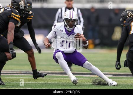 James Madison quarterback Alonza Barnett III (14) throws a pass under ...