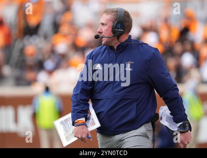 UTEP head coach Scotty Walden leads his team onto the field during an ...