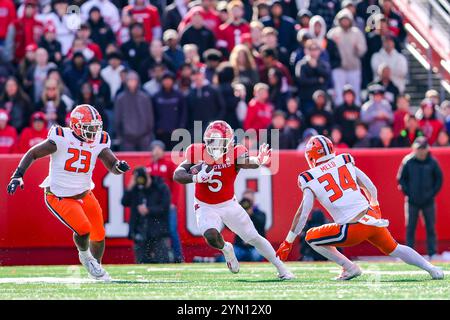 Rutgers' Kyle Monangai (23) rushes against Michigan State's Cal Haladay ...