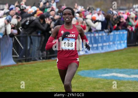 Doris Lemngole of Alabama wins the women's race in 18:25.4 during the ...