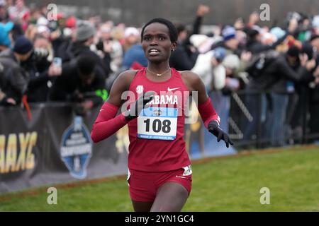 Doris Lemngole of Alabama wins the women's race in 18:25.4 during the ...