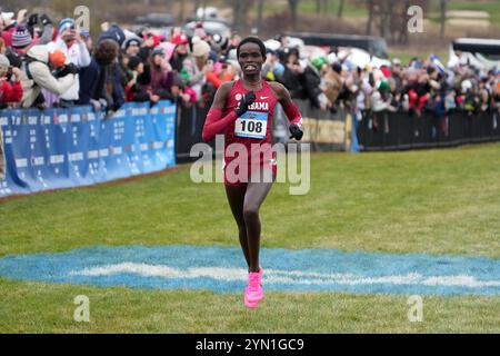 Doris Lemngole of Alabama wins the women's race in 18:25.4 during the ...