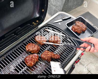 Sizzling grilled meat that showcases a perfect char Stock Photo - Alamy