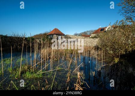 Alciston, November 22nd 2024: The village sign Stock Photo - Alamy
