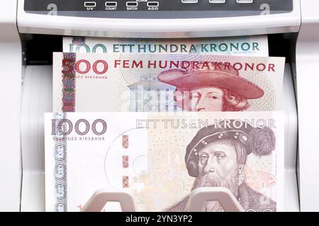 Swedish money - Crown in the counting machine Stock Photo - Alamy