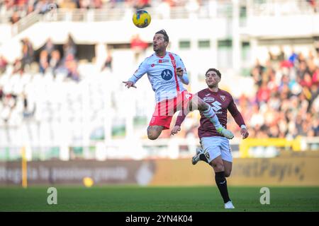 Armando Izzo of AC Monza competes for the ball with Luca D'Andrea of US ...