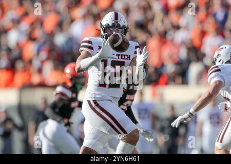 Texas Tech tight end Jalin Conyers (12) scores a touchdown past ...