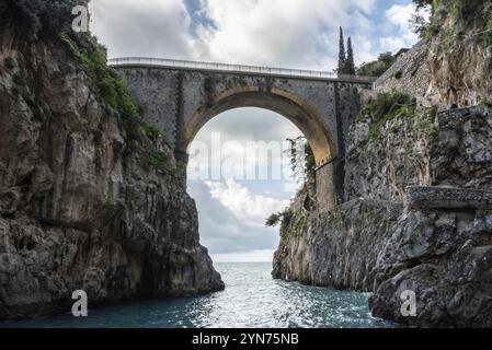 Scenic arch bridge at the Fjord of Fury, Amalfi Coast of Southern Italy ...