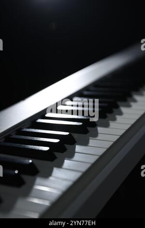 Synthesizer on black background, closeup. Electronic musical instrument ...