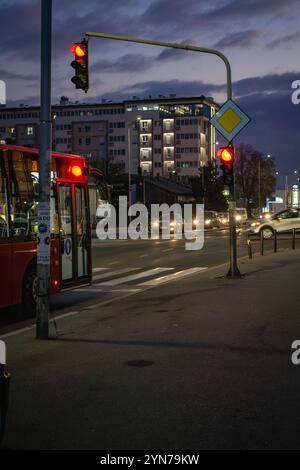 Cars waiting at red light at intersection Stock Photo - Alamy