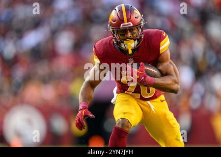 Washington Commanders running back Jeremy McNichols (26) warms up ...