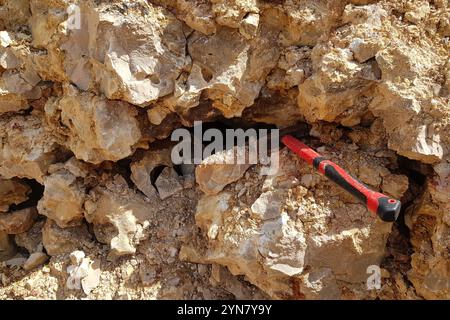 Karst cavity in a fractured limestone rock outcrop. Kaluga region ...