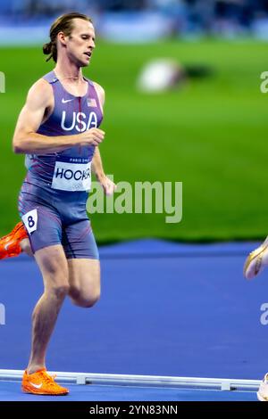 Cole HOCKER of USA competes in Heat 1 of the Men's 5000 metres during ...