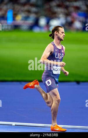 Cole HOCKER of USA competes in Heat 1 of the Men's 5000 metres during ...