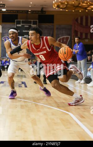 Wisconsin guard John Tonje drives to the basket against Northwestern ...
