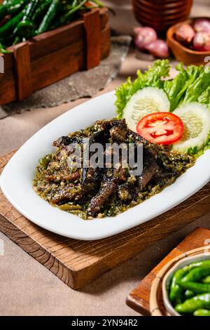 Fried eel with green chili sauce or belut goreng cabe ijo is a ...