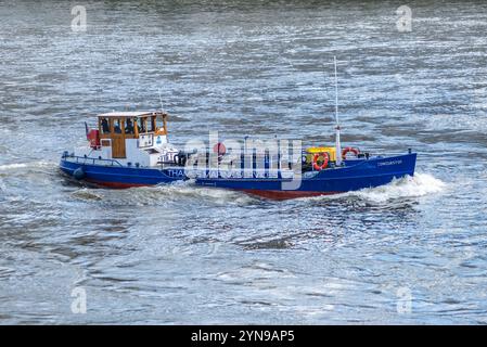 'Conquestor' a motorised fuel tanker barge heading upstream on the ...