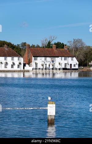 The Royal Oak public house and Langstone Mill on the shoreline at the ...