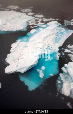 Ice floe floating on water Stock Photo - Alamy