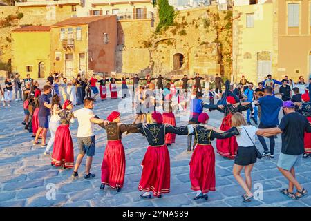 Group of people performing traditional Greek dance, Chania, Crete ...