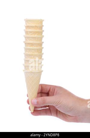 Hand hold stake of ice cream cones. White background Stock Photo - Alamy