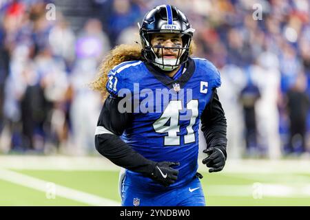 Detroit Lions linebacker Grant Stuard (15) returns a kick during a ...