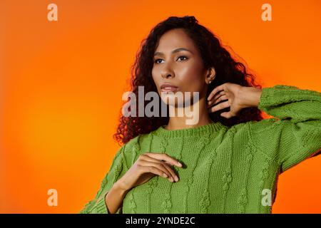 A striking woman poses thoughtfully, showcasing her beauty and ...