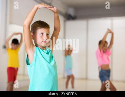 Children learn dance movements in dance class Stock Photo - Alamy