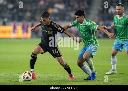 LAFC defender Sergi Palencia (14) shields LA Galaxy forward Joseph ...