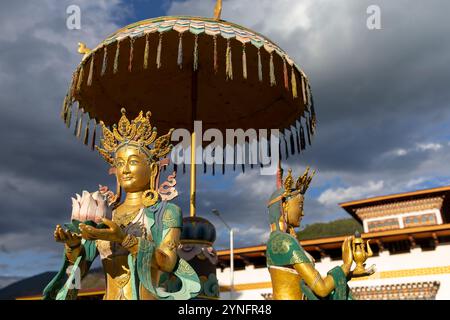 Golden female god statues at the roundabout in Thimphu, Bhutan Stock ...