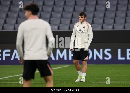 Joao Neves of Paris Saint-Germain FC lifts the trophy during the award ...