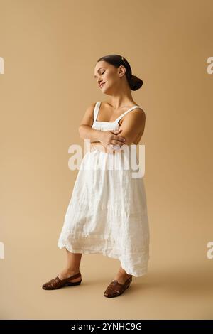 Stylish young woman with short stature poses confidently in denim ...