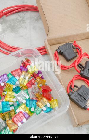 Colourful assortment of automotive blade fuses and waterproof fuse ...