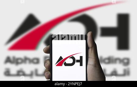 Alpha Dhabi Holding (ADH) logo on smartphone Stock Photo - Alamy